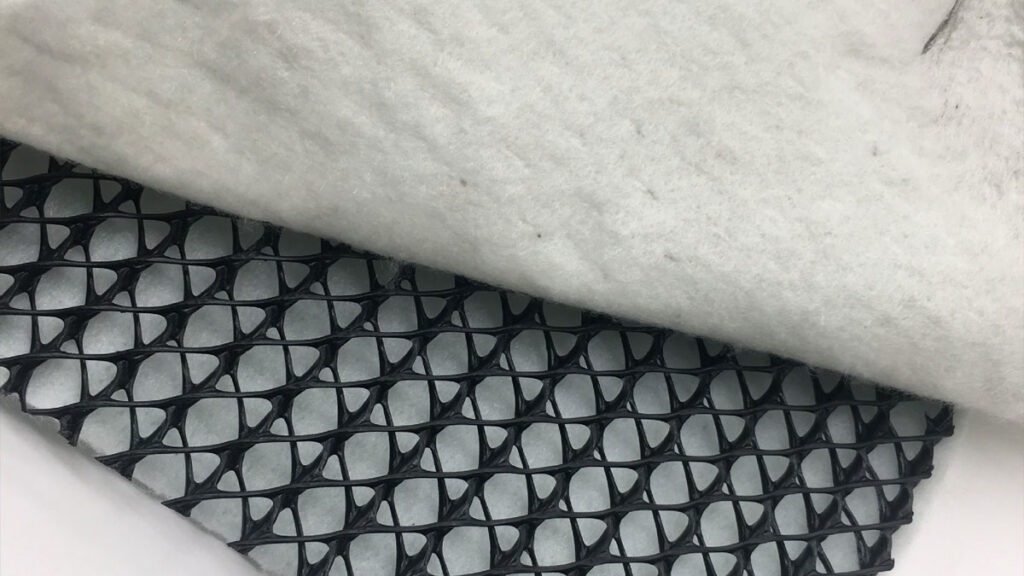 What are geocomposite materials and their applications?